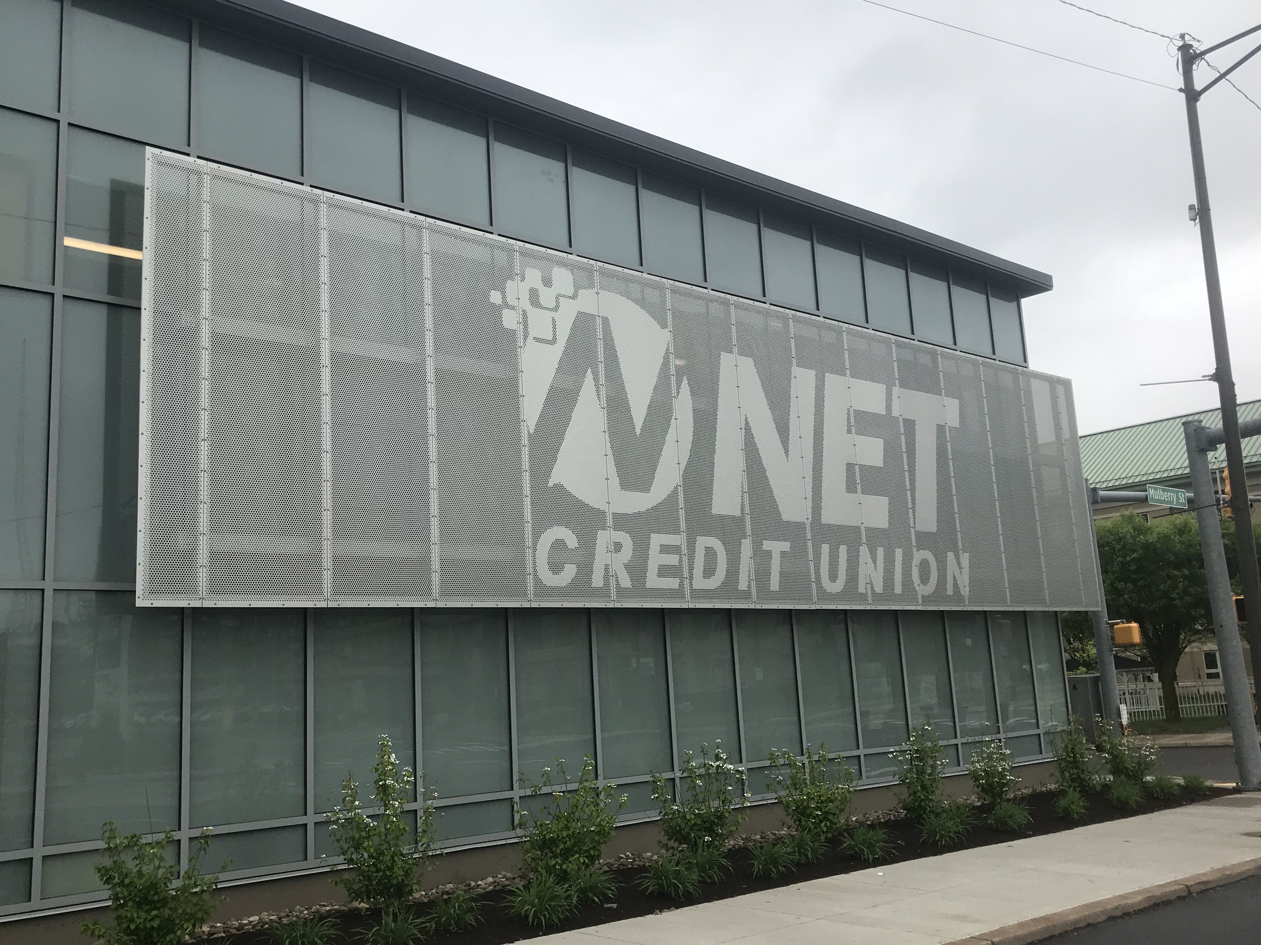 Plant Graphics With Perforated Metal Panels