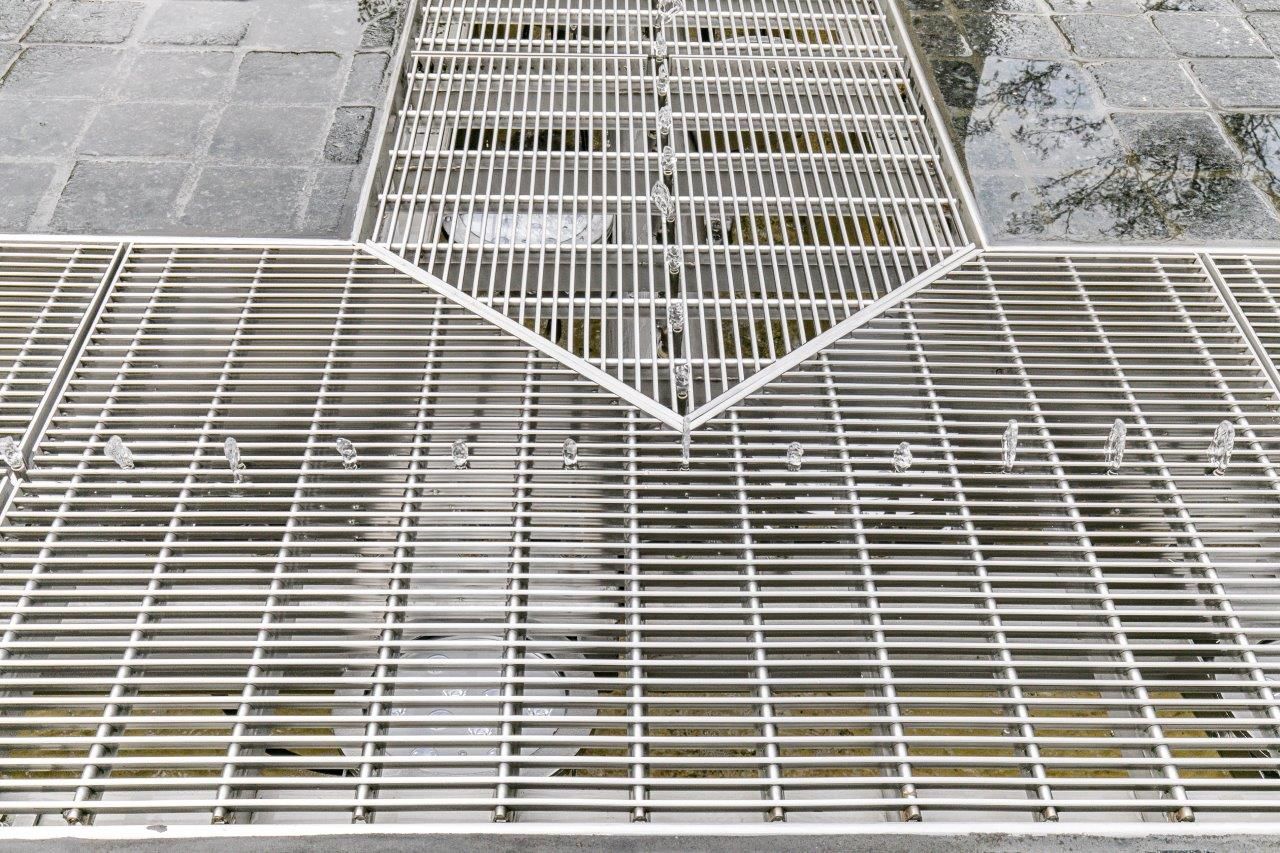 Metal Fountain Grating at Kiener Plaza Park | Hendrick