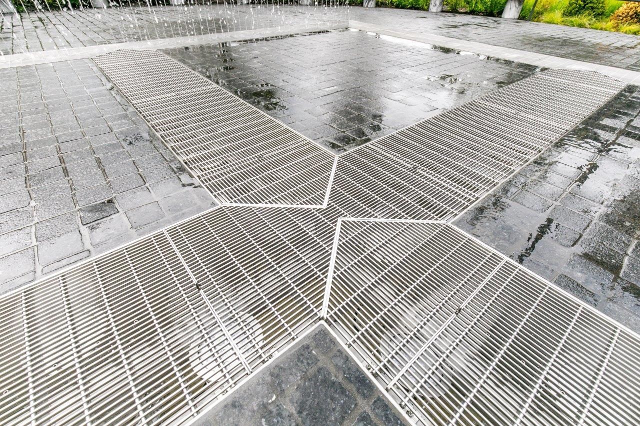 Metal Fountain Grating at Kiener Plaza Park | Hendrick